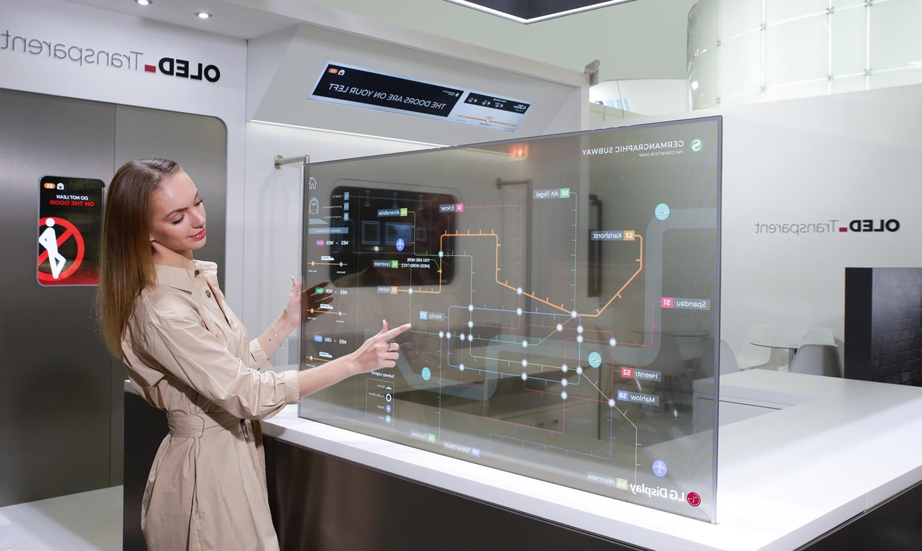 LG Display introduced a transparent OLED screen for trains showing the ...